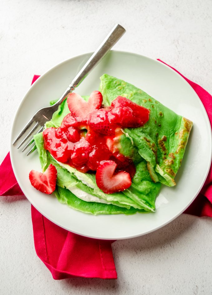 Grinch Crepes (Green Crepes with Strawberry Sauce) - Fresh April Flours
