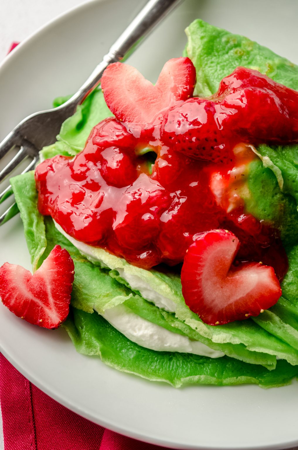 Grinch Crepes (Green Crepes with Strawberry Sauce) - Fresh April Flours